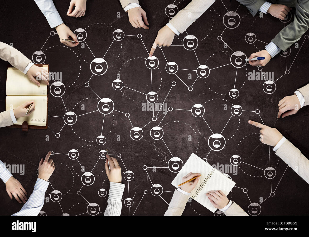 Top view of people hands drawing networking strategy Stock Photo - Alamy