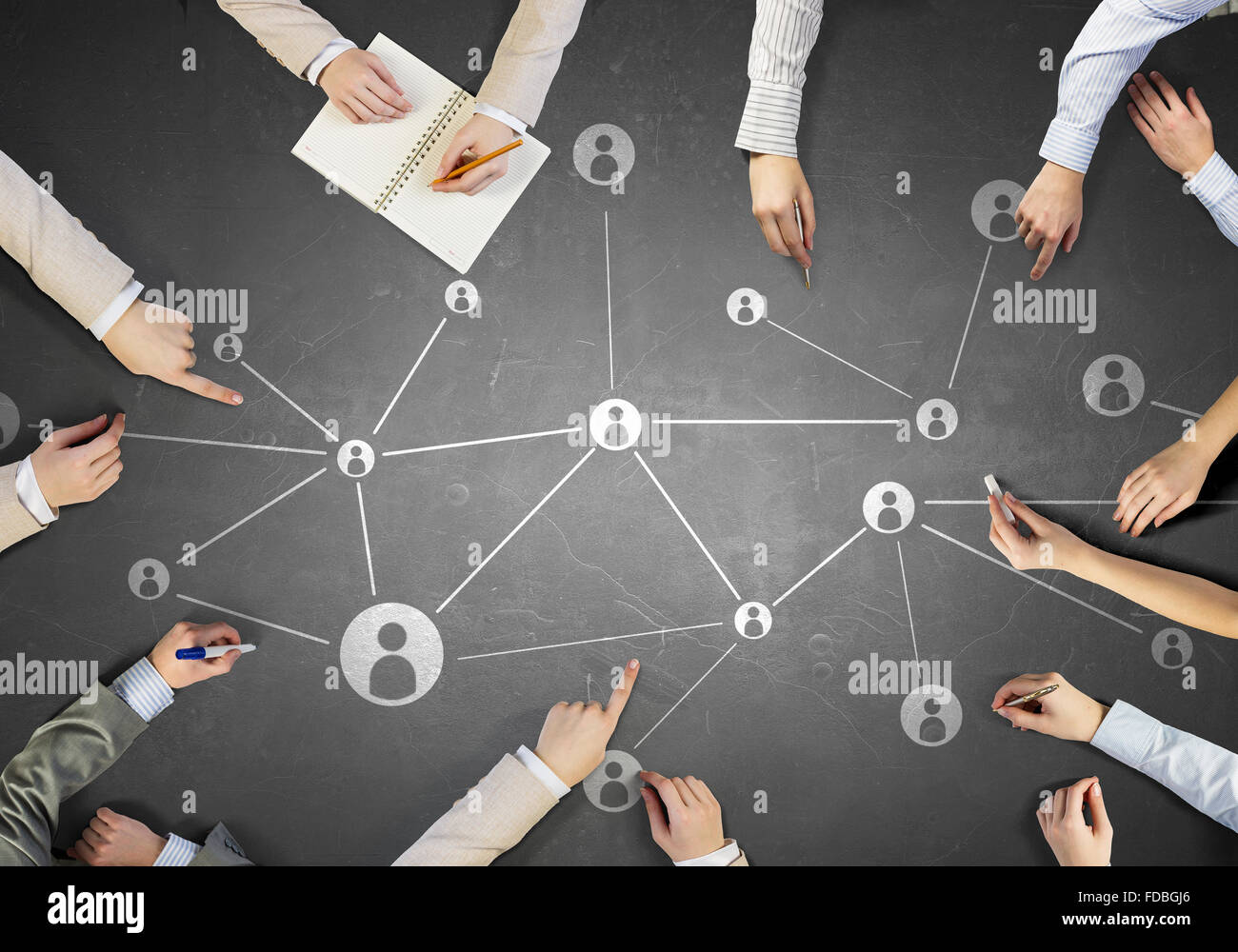 Top view of people hands drawing networking strategy Stock Photo - Alamy
