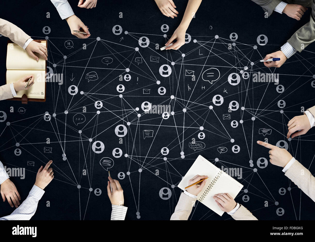 Top view of people hands drawing networking strategy Stock Photo - Alamy