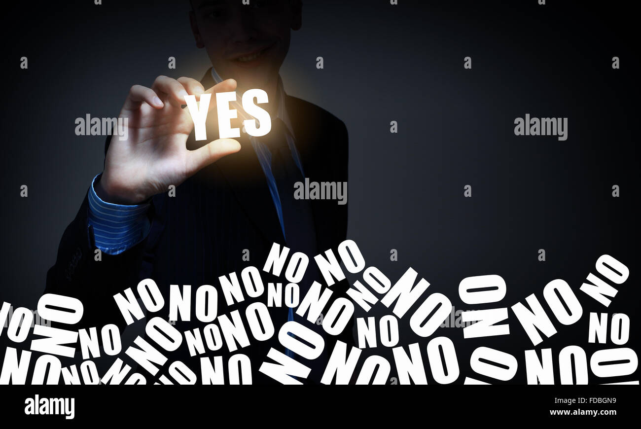 Hand of businessman taking word yes with fingers Stock Photo - Alamy