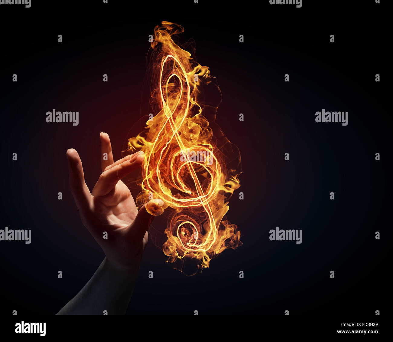 Music light glowing symbol in palm on dark background Stock Photo - Alamy