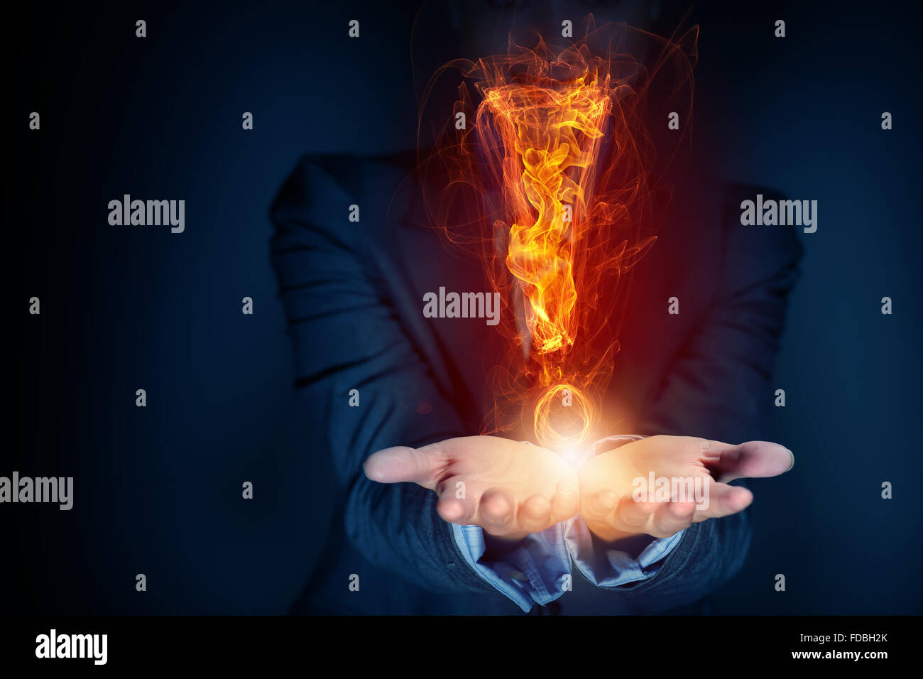 Glowing exclamation mark symbol in palms on dark background Stock Photo ...