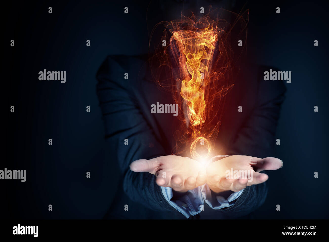 Glowing exclamation mark symbol in palms on dark background Stock Photo ...