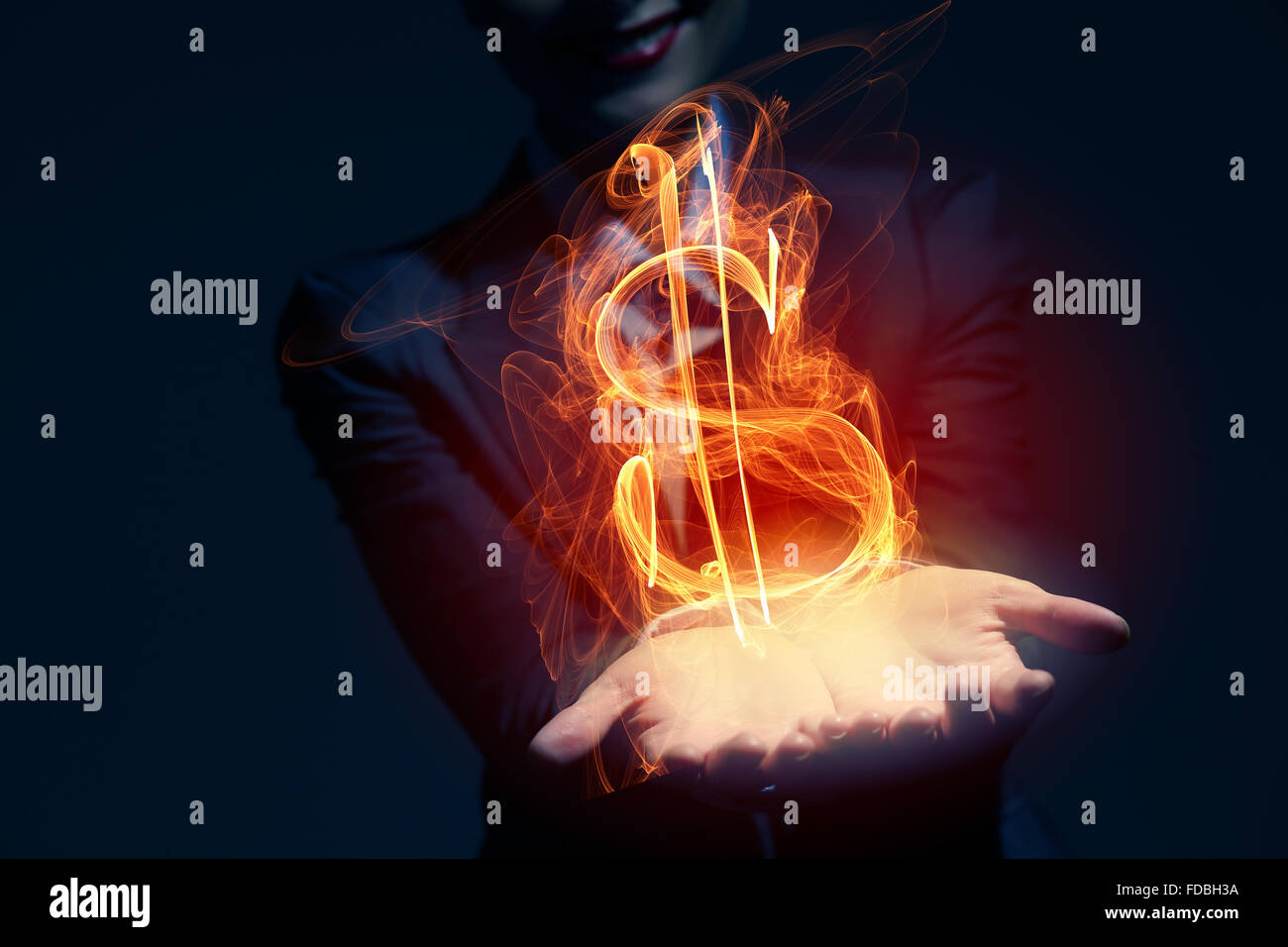 Burning dollar sign in businessman palm on dark background Stock Photo ...