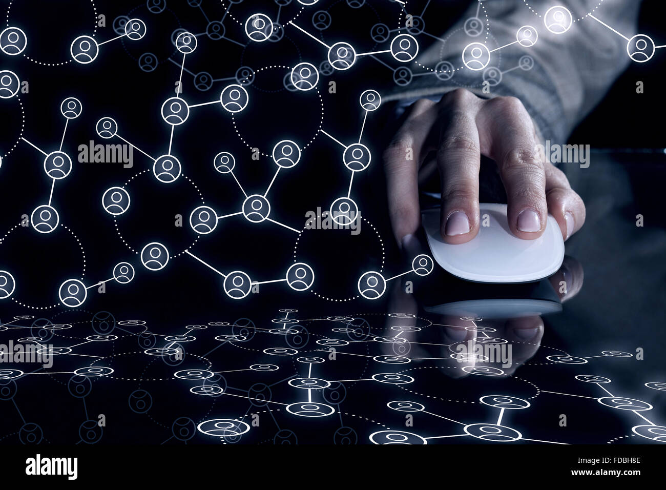 Close up view businessman hand using computer mouse on reflective black ...