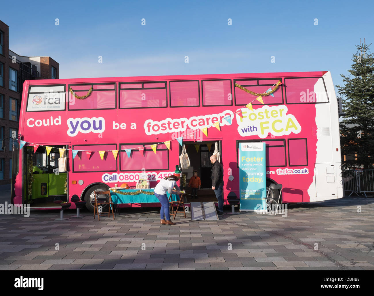 Charity bus at Gloucester docks Stock Photo - Alamy