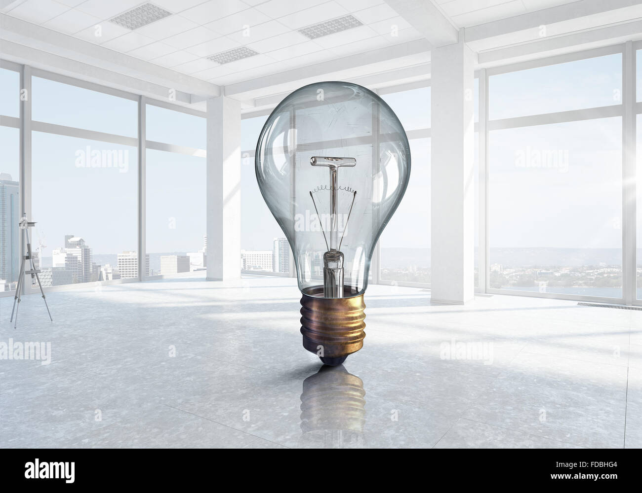 Glass light bulb against room with large window looking on city Stock ...
