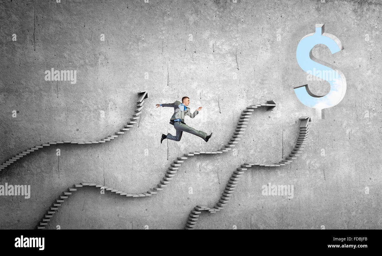 Businessman running on ladder leading to financial success Stock Photo ...