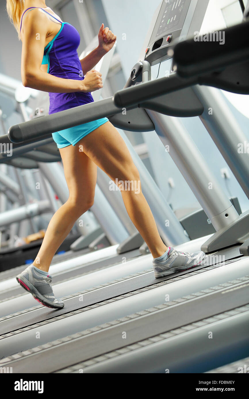 Image of fitness girl running on treadmill Stock Photo - Alamy