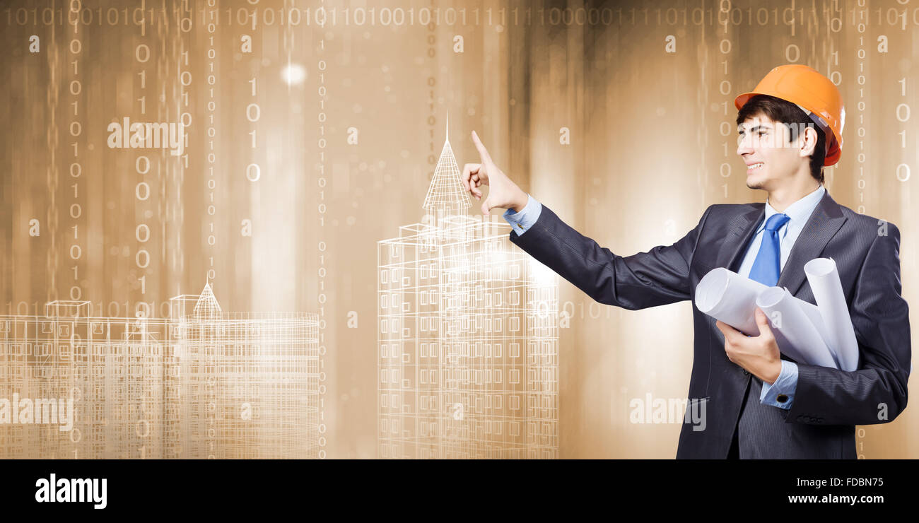 Young man engineer touching icon of media screen Stock Photo - Alamy