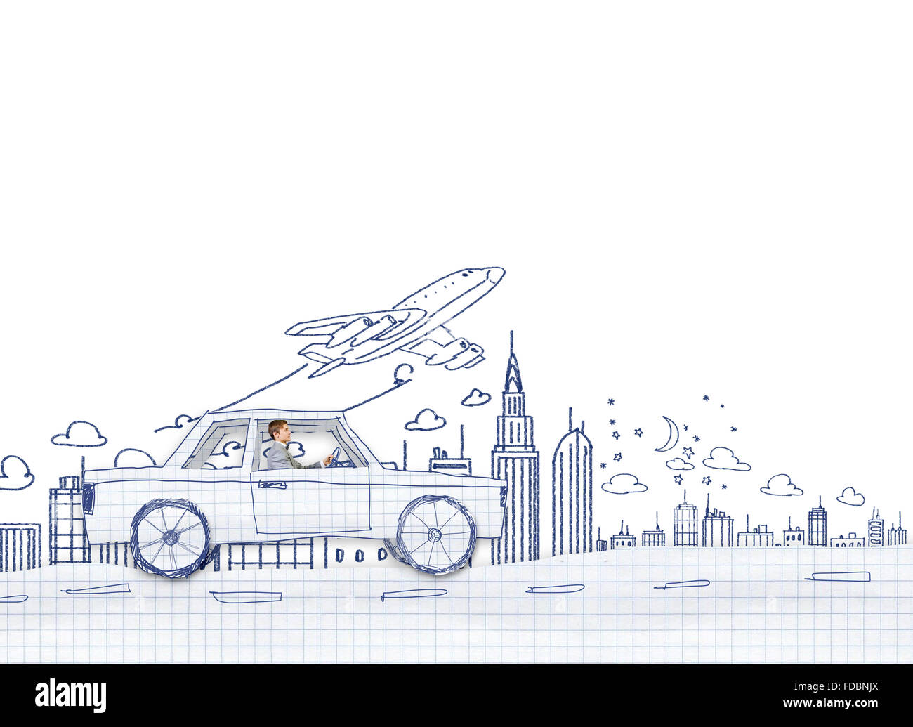 Young man driving car made of sheet of paper Stock Photo - Alamy