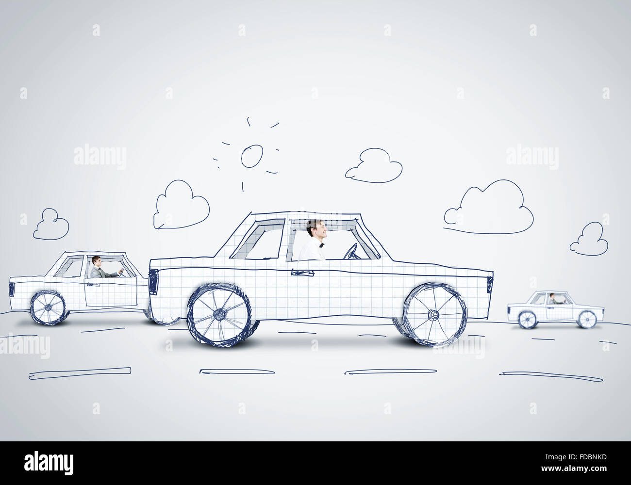 Young man driving car made of sheet of paper Stock Photo - Alamy