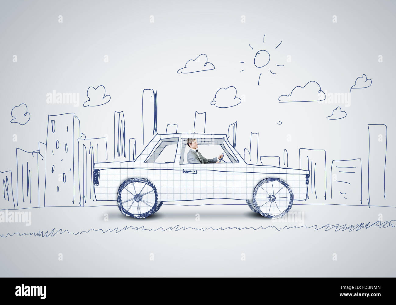 Young man driving car made of sheet of paper Stock Photo - Alamy