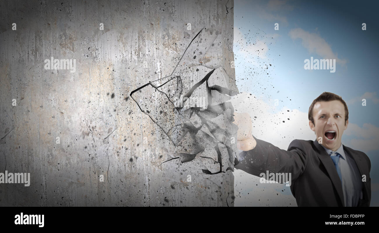 Businessman breaking stone wall karate hi-res stock photography and ...