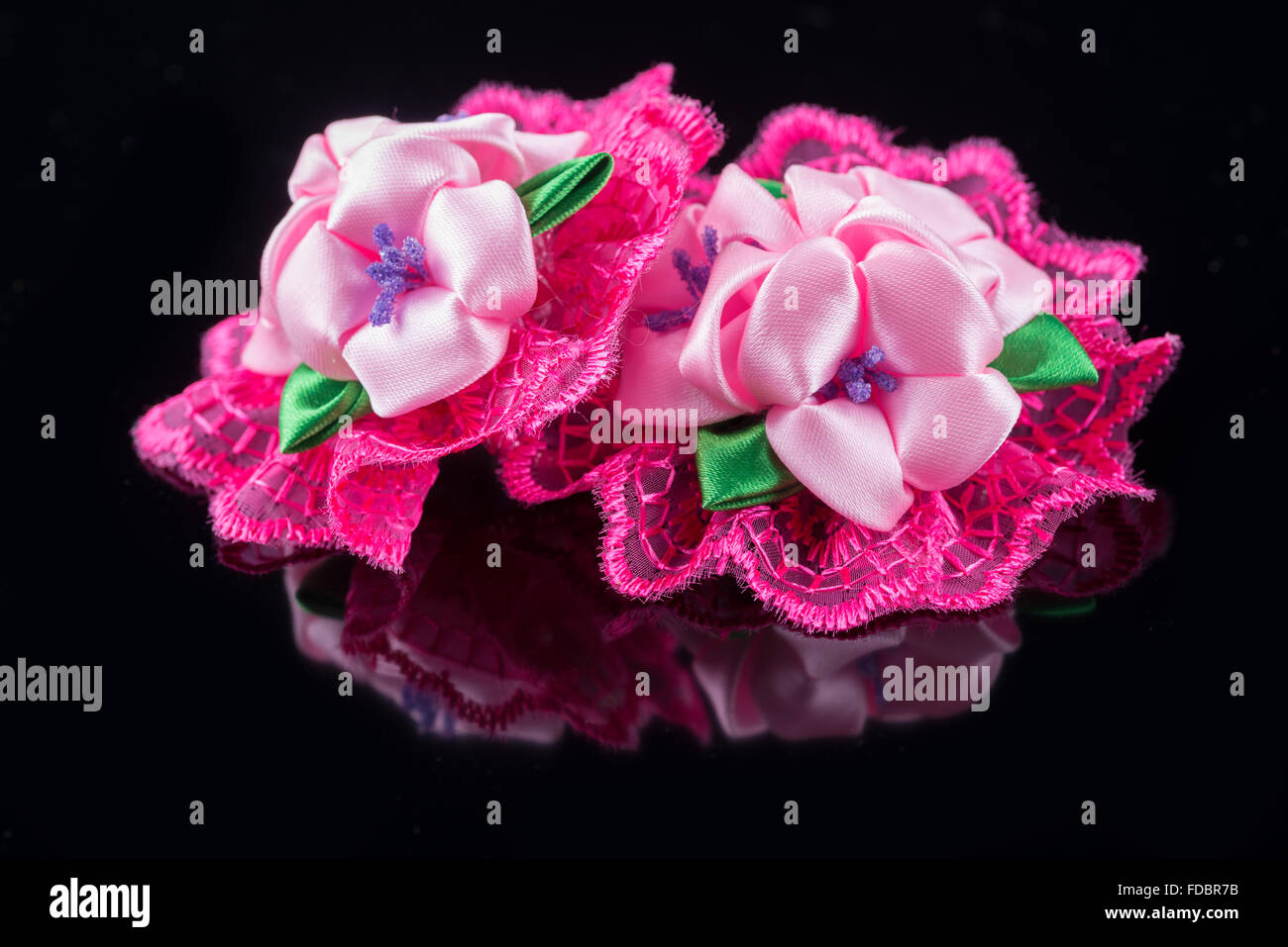 Pink flower hair band handmade Stock Photo - Alamy