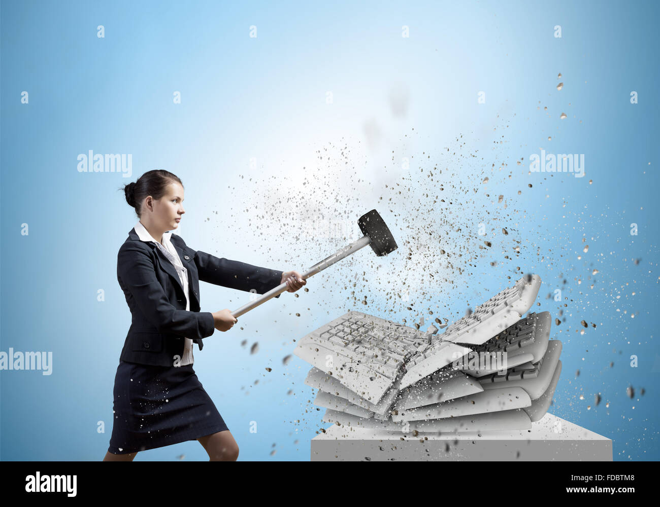 Businesswoman in anger crashing keyboard with hammer Stock Photo - Alamy