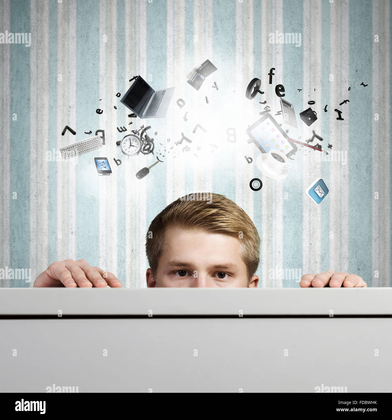 Half of face of businessman looking out from under the table Stock ...