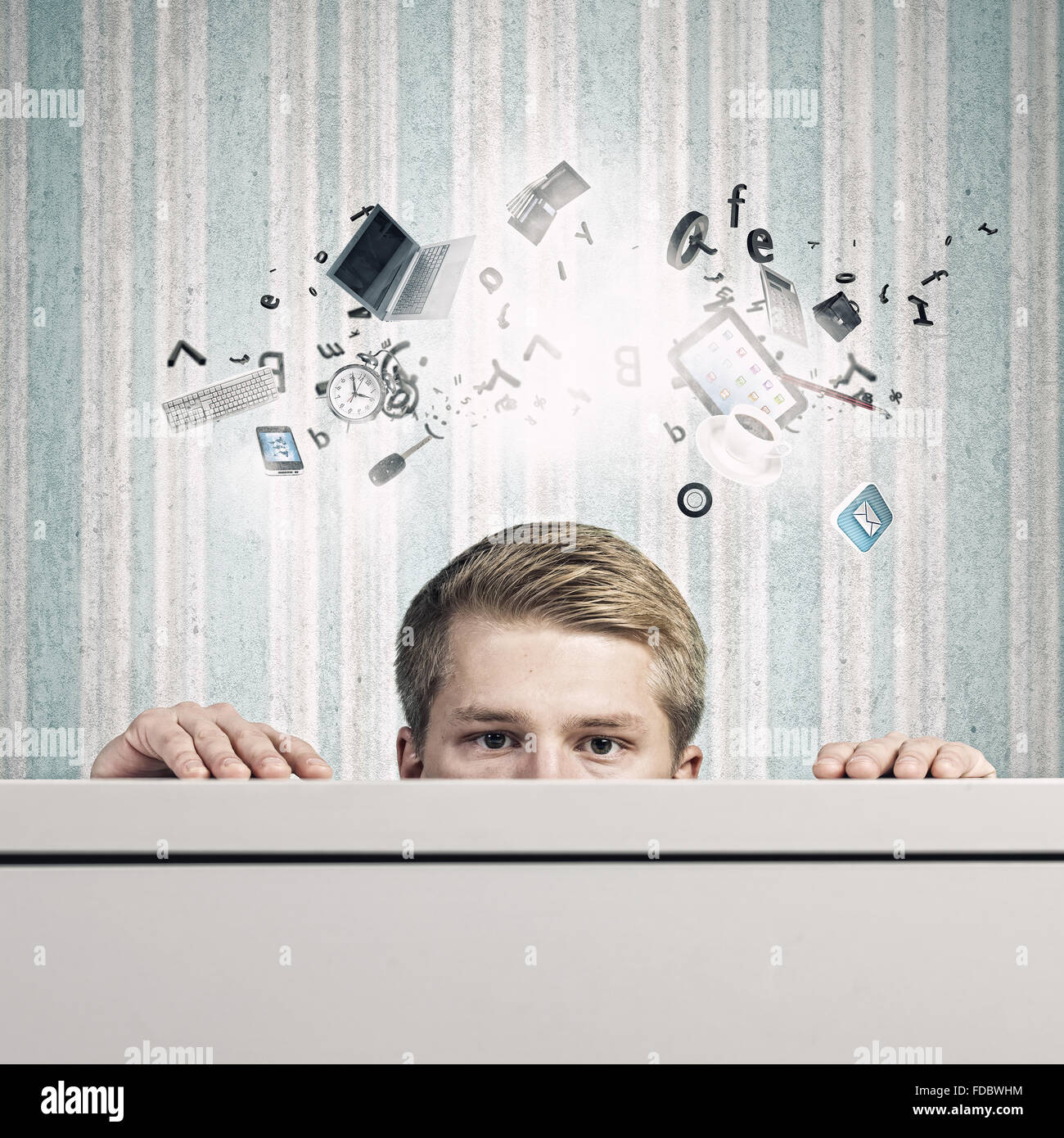 Half of face of businessman looking out from under the table Stock ...