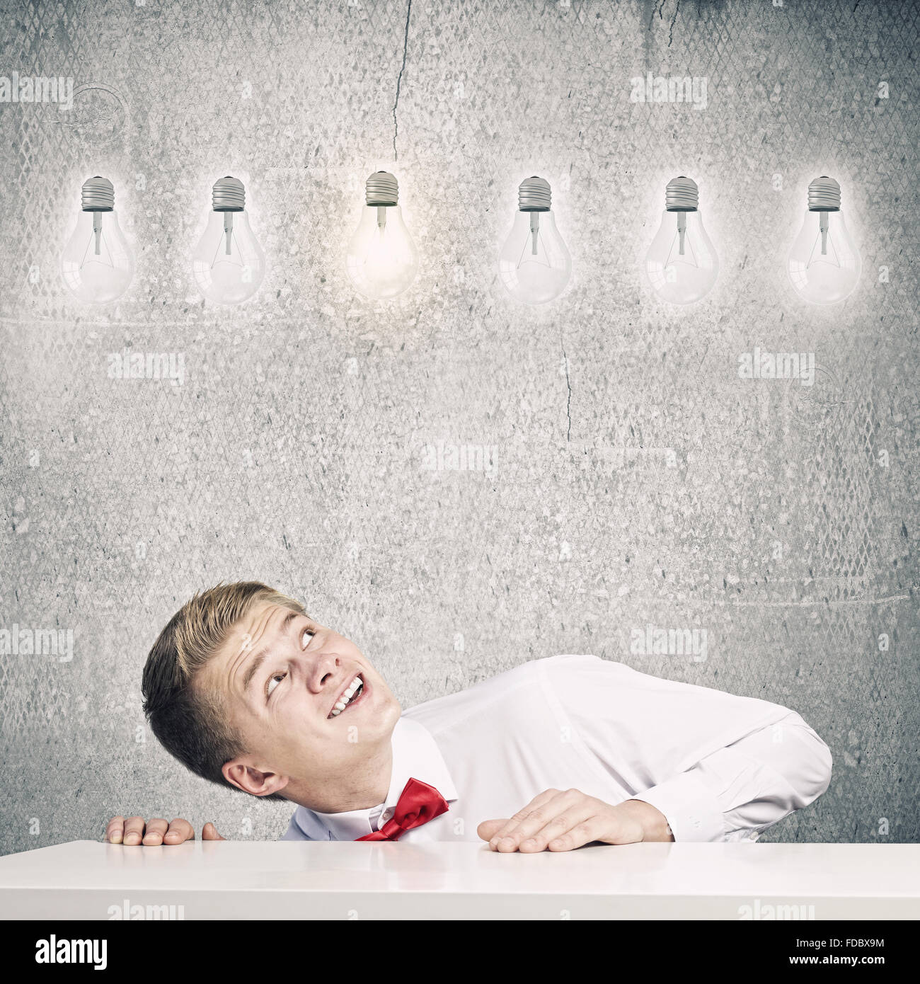Boy lightbulb above head hi-res stock photography and images - Alamy