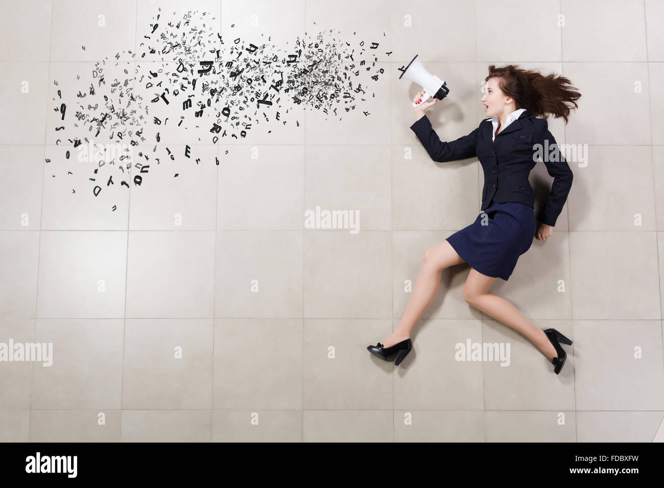 Funny image of businesswoman running with megaphone in hands Stock ...