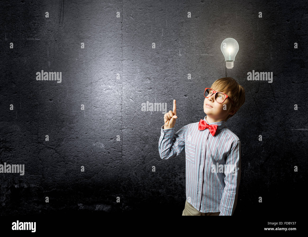 Genius boy in red glasses near blackboard with formulas Stock Photo - Alamy