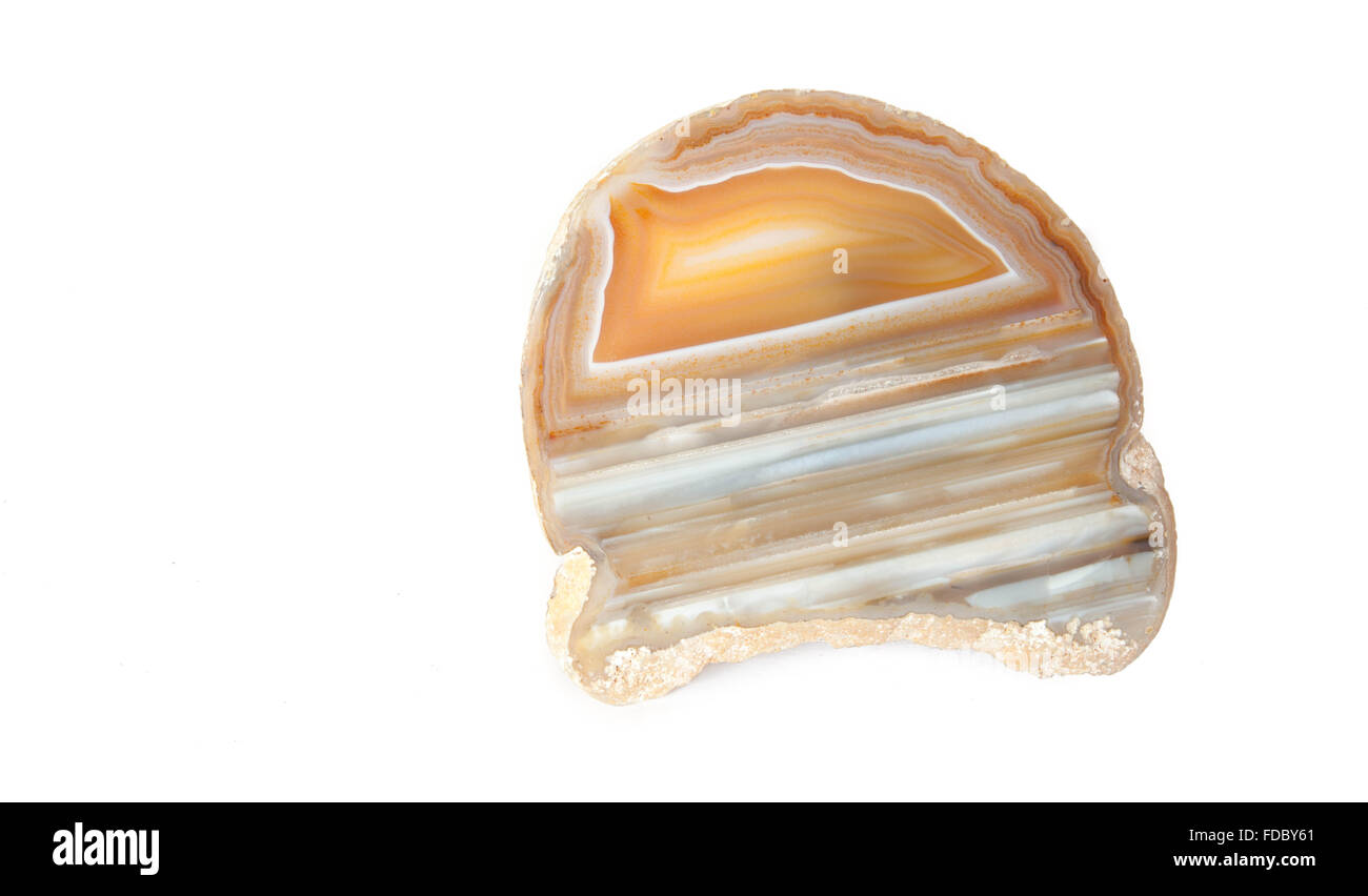 Section of a white and orange geode in white background Stock Photo - Alamy