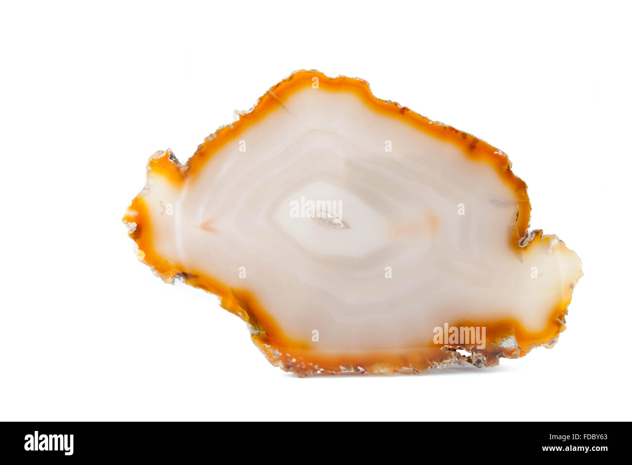 Section of a white and orange geode in white background Stock Photo - Alamy