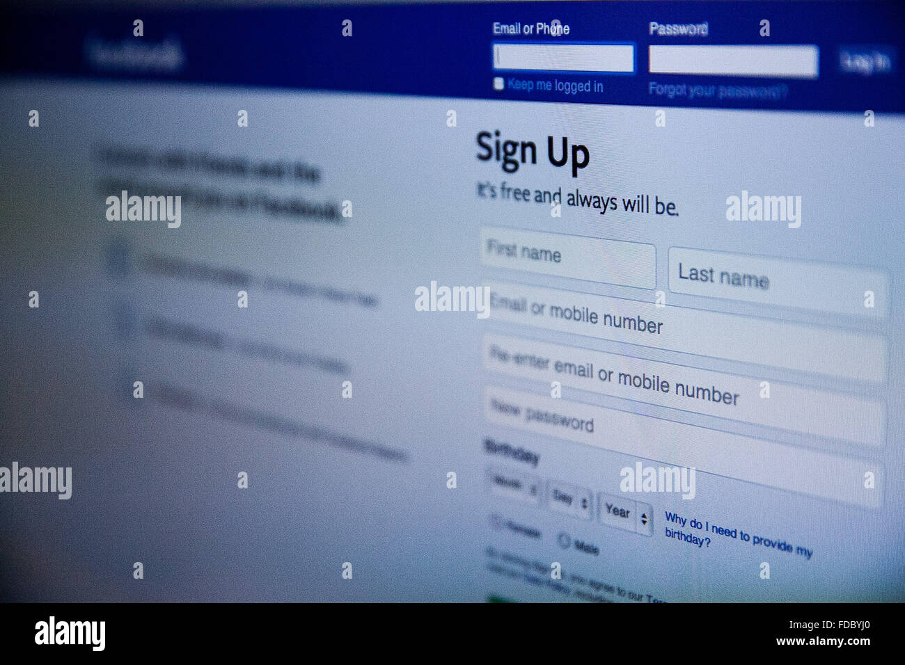 Facebook homepage on a monitor screen. Facebook is the world’s largest ...