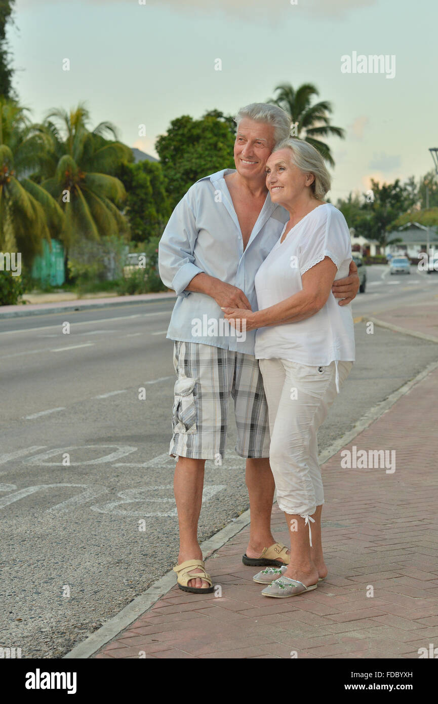 elderly couple rest at tropical resort Stock Photo - Alamy