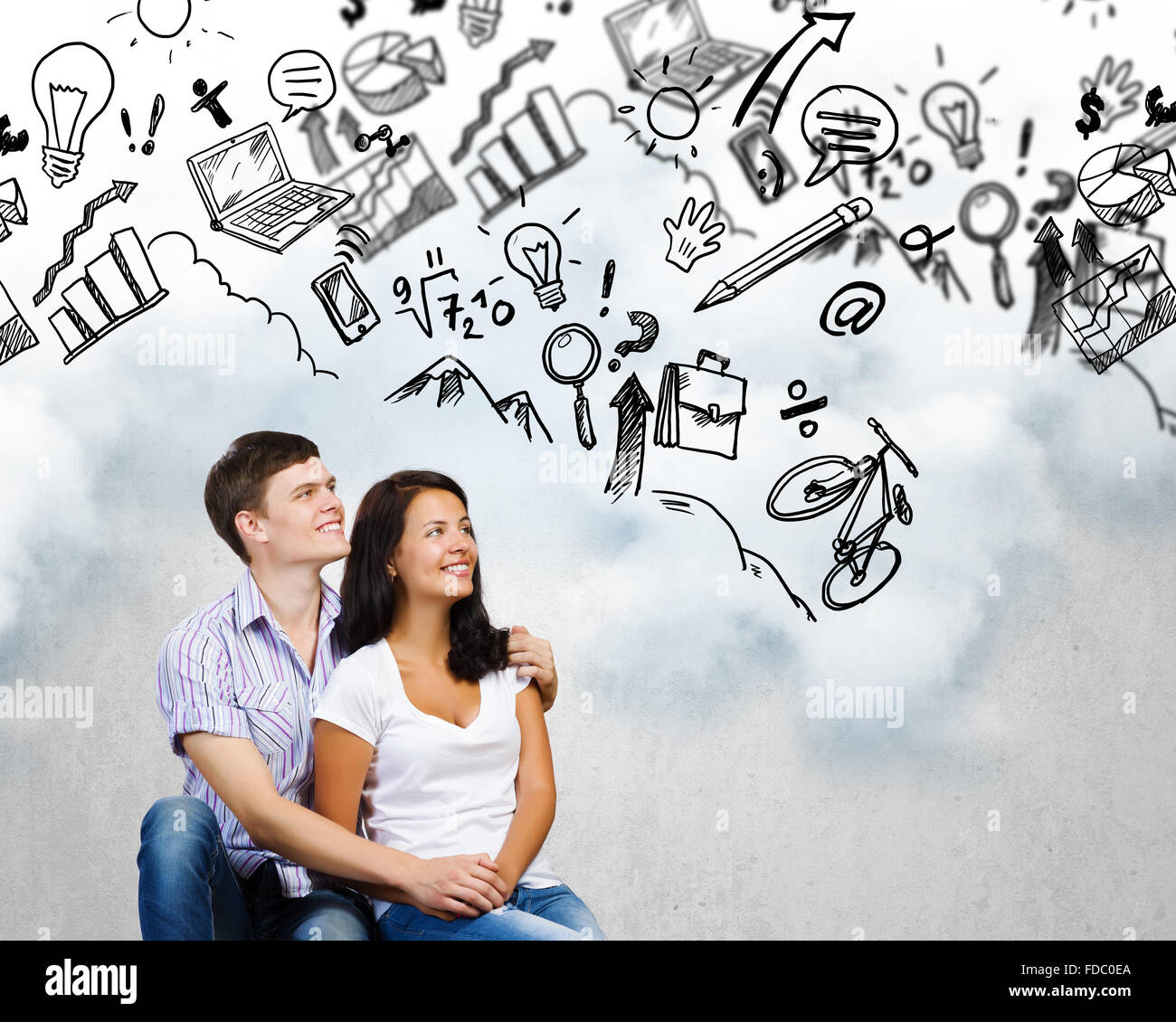 Young couple hugging each other and dreaming about future Stock Photo ...