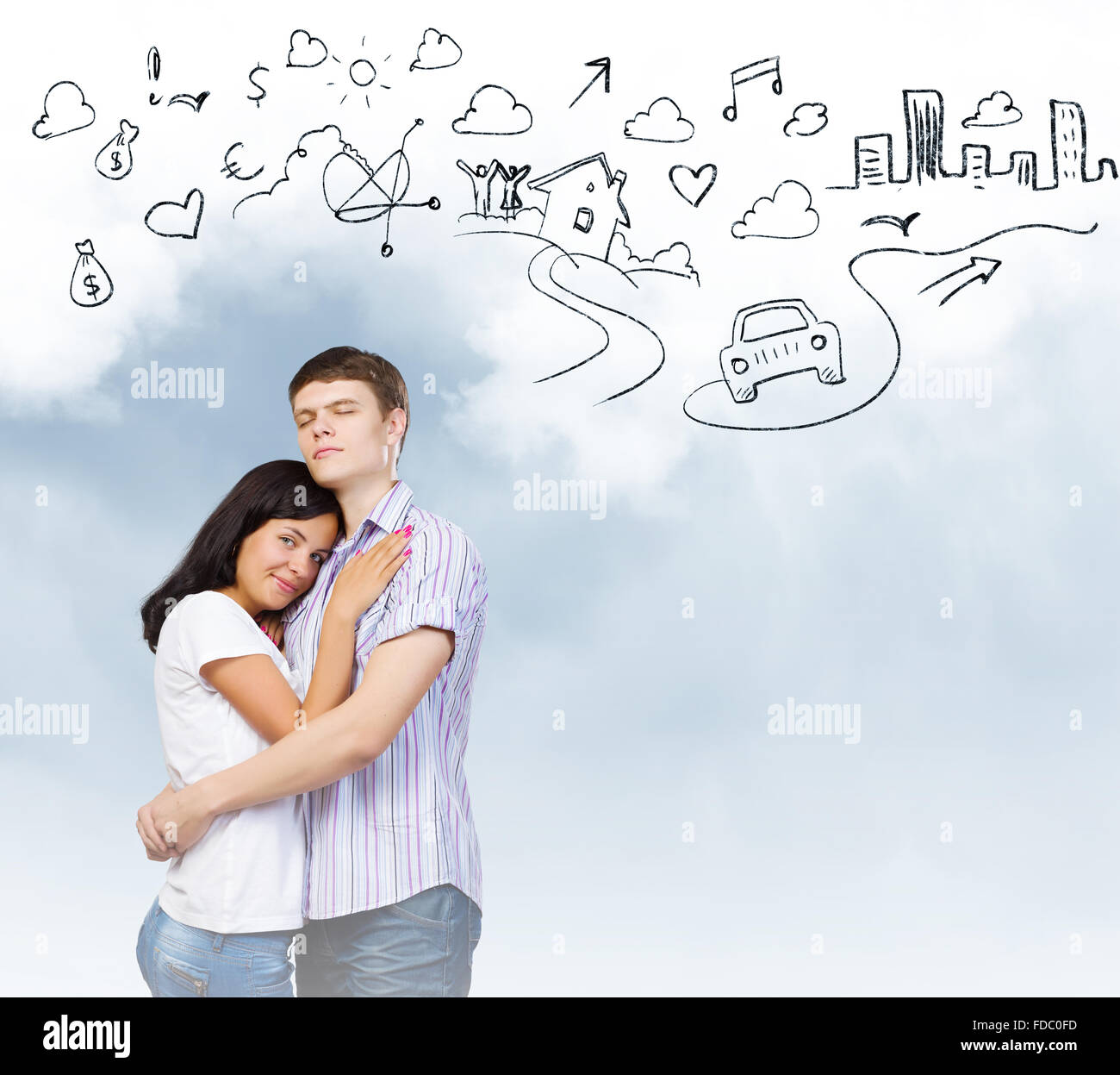 Young couple hugging each other and dreaming about future Stock Photo ...