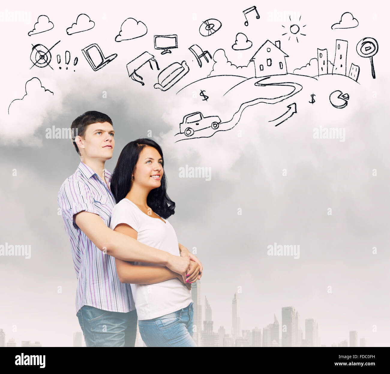 Young couple hugging each other and dreaming about future Stock Photo ...