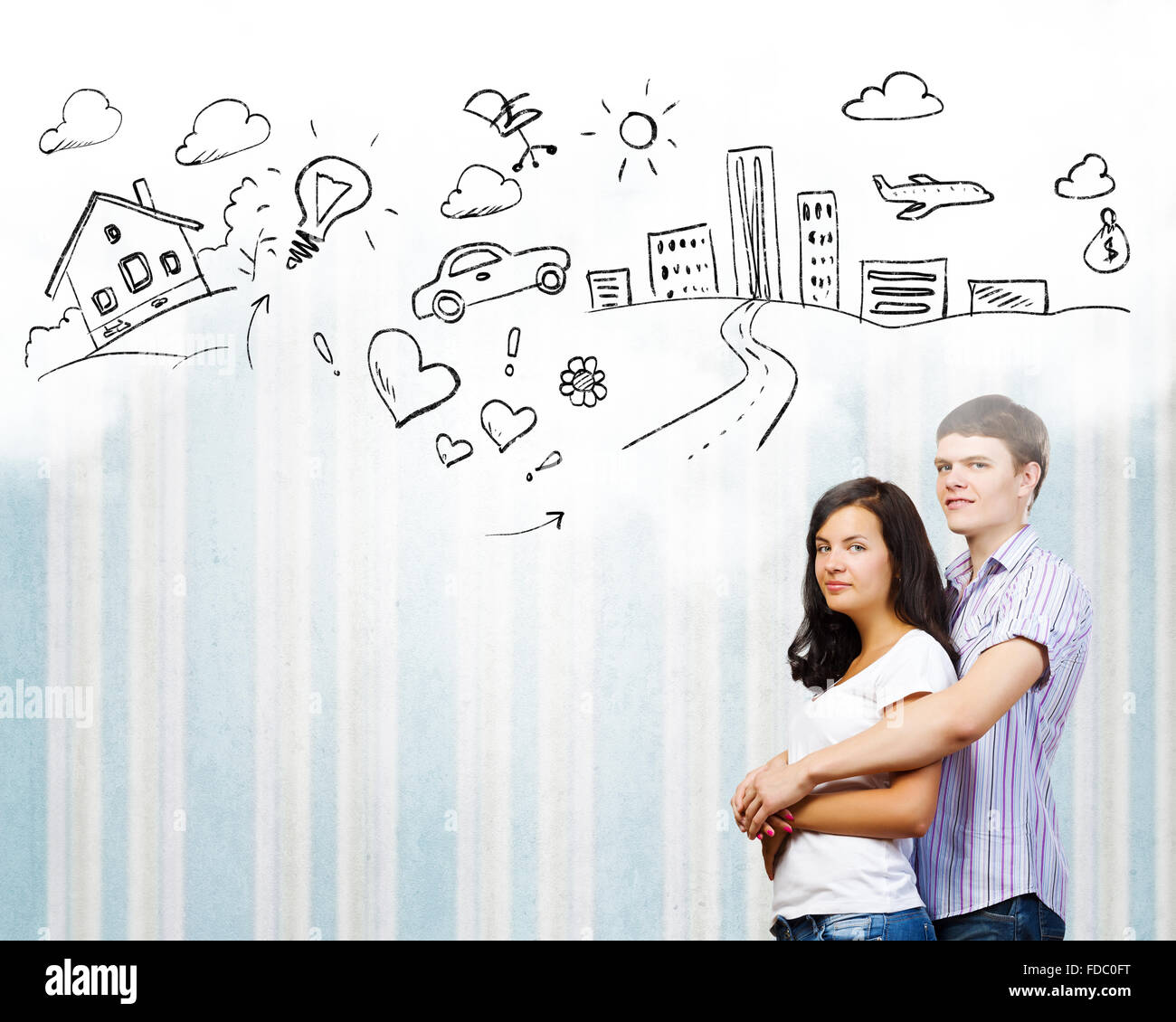 Young couple hugging each other and dreaming about future Stock Photo ...