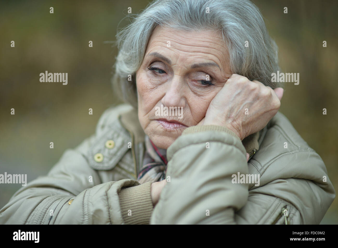 Nice sad old woman Stock Photo - Alamy