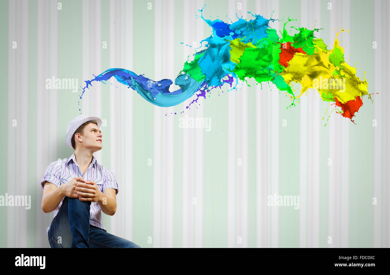 Young man in casual sitting and thinking. Creativity concept Stock ...