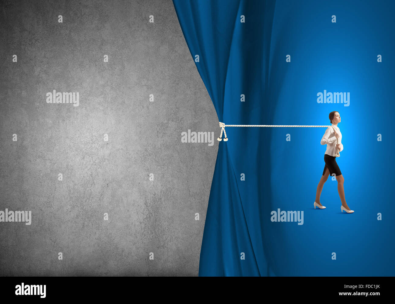 Young businesswoman pulling curtain with rope. Place for text Stock ...