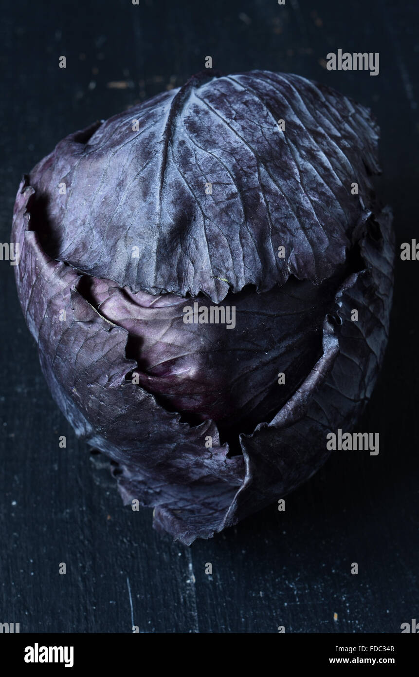 Red cabbage on wooden background close up shoot Stock Photo - Alamy