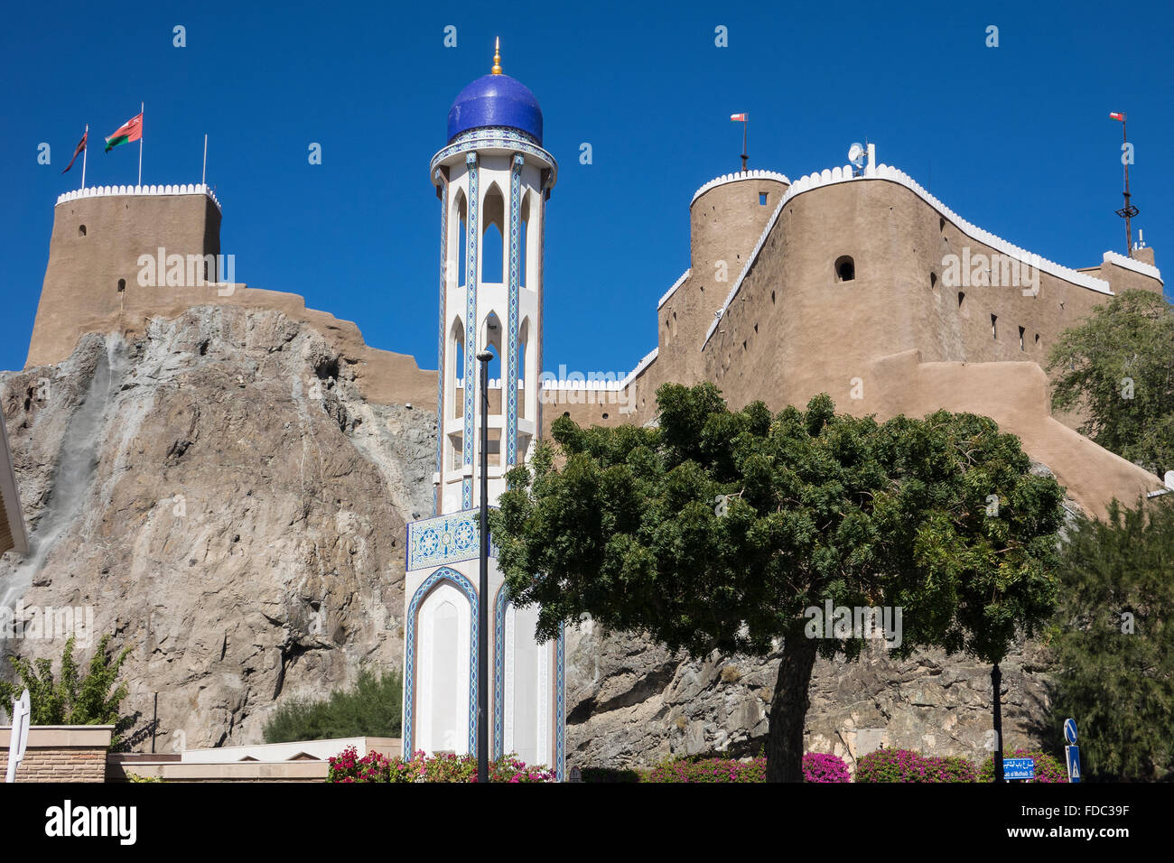 Oman, Muscat, Old Muscat minaret & fort Stock Photo - Alamy