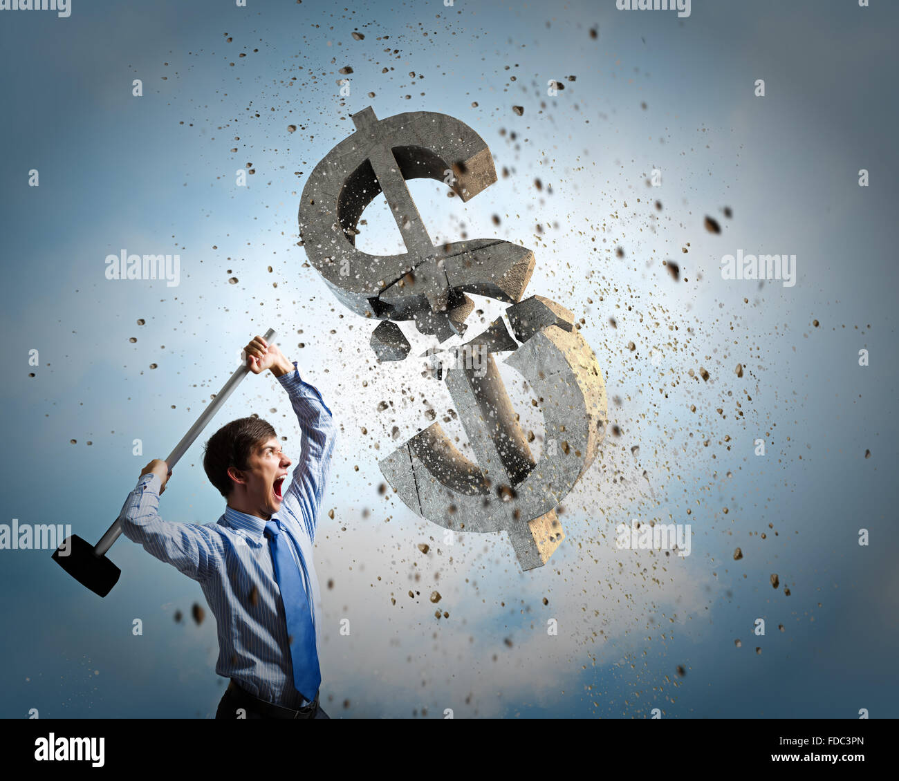 Young businessman crashing with hammer stone dollar symbol Stock Photo ...