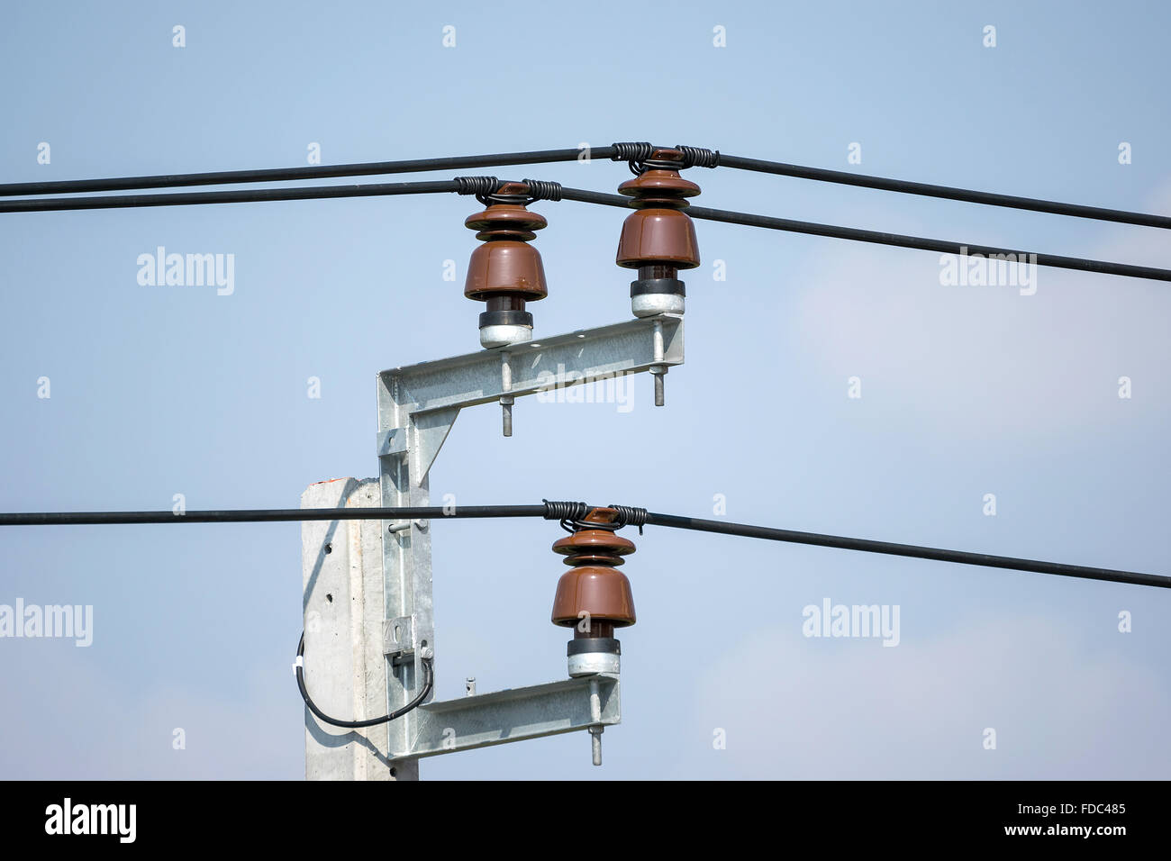 Close up of power line insulators Stock Photo - Alamy