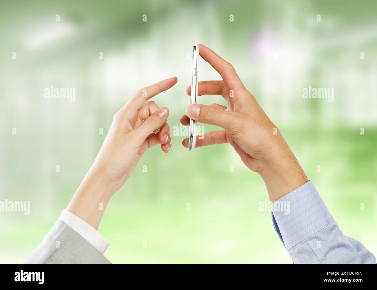 Close up of people hands using mobile phone Stock Photo - Alamy