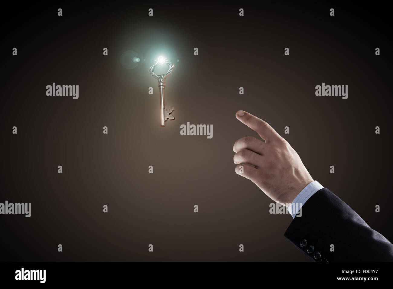Close up of human hand touching key Stock Photo - Alamy