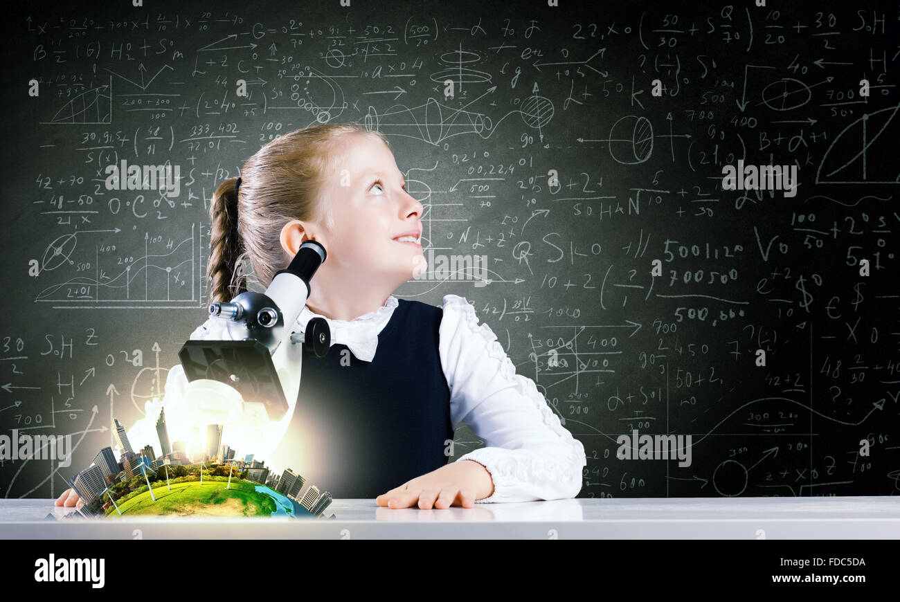 Cute girl with microscope against blackboard. Elements of this image ...
