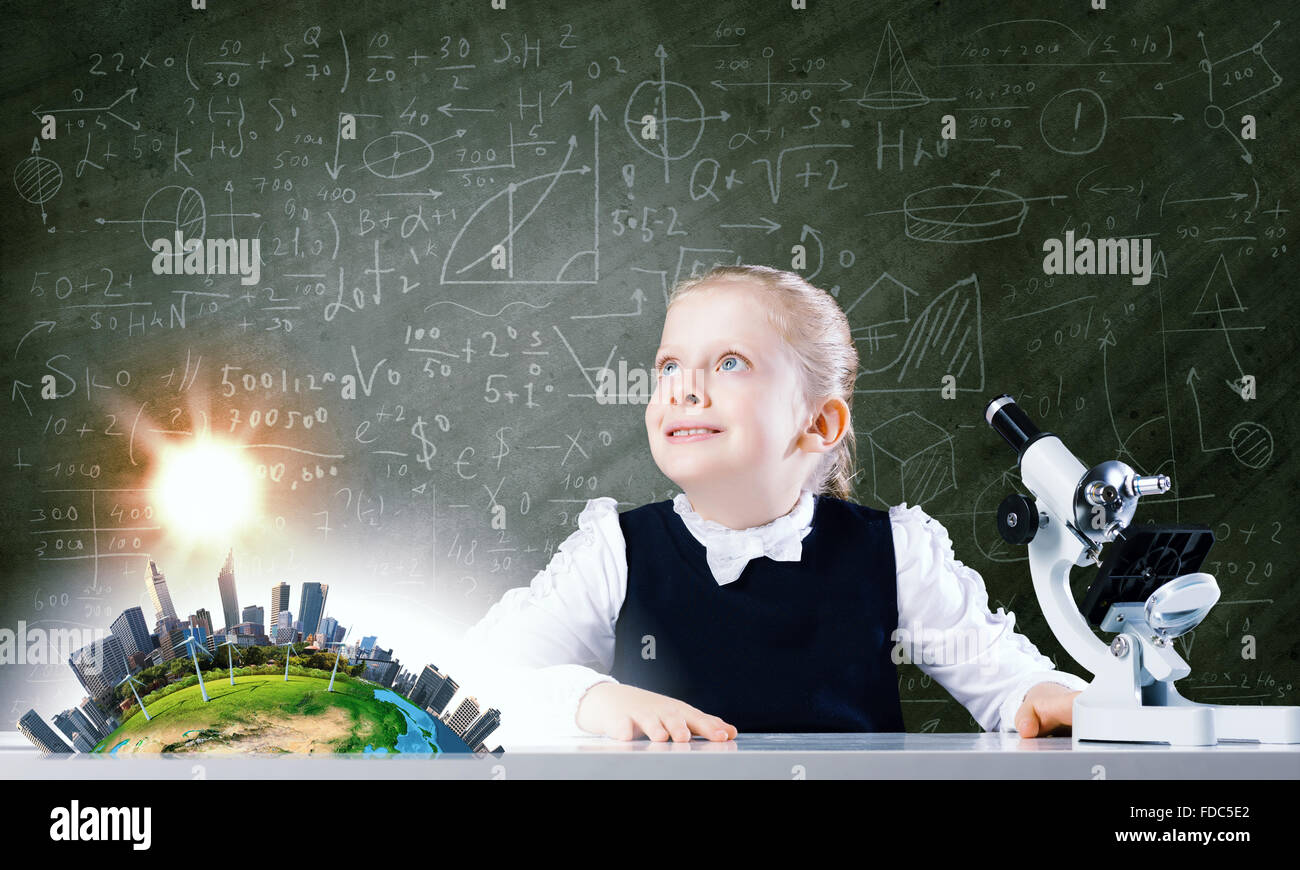 Cute girl with microscope against blackboard. Elements of this image ...