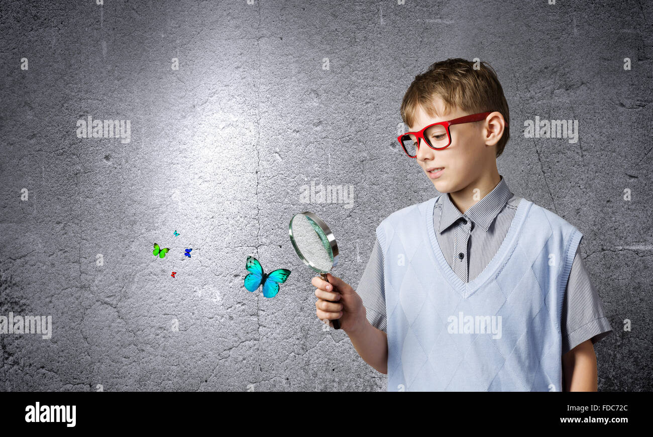 Boy with butterfly hi-res stock photography and images - Alamy