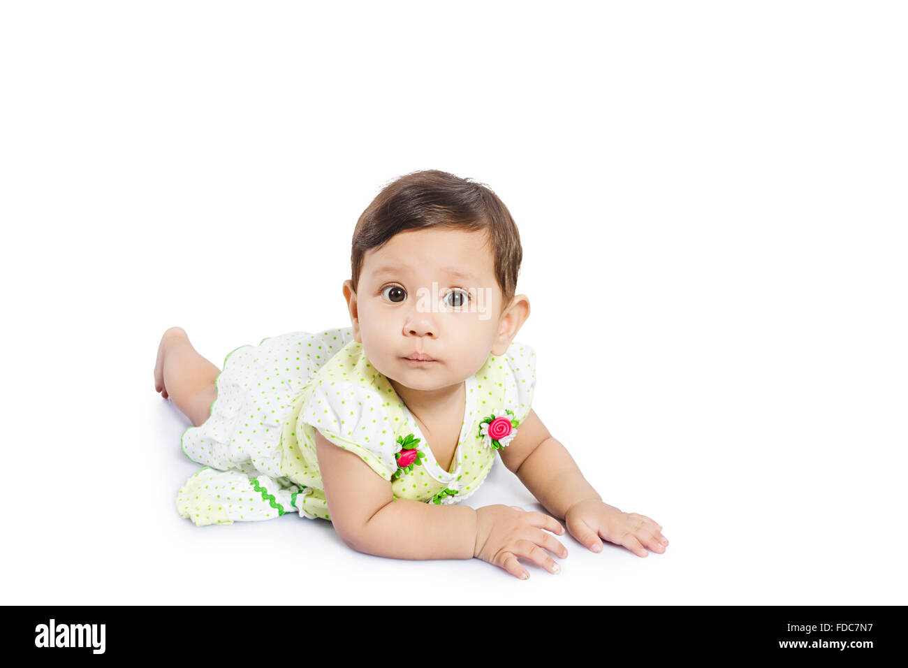 Baby girl looking at camera Cut Out Stock Images & Pictures - Alamy