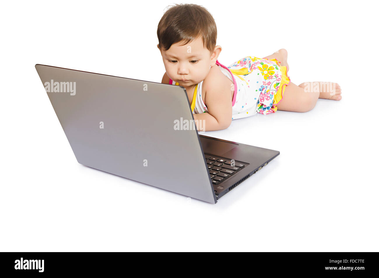 1 Child Baby Girl Floor Lying Down Laptop Education Stock Photo - Alamy