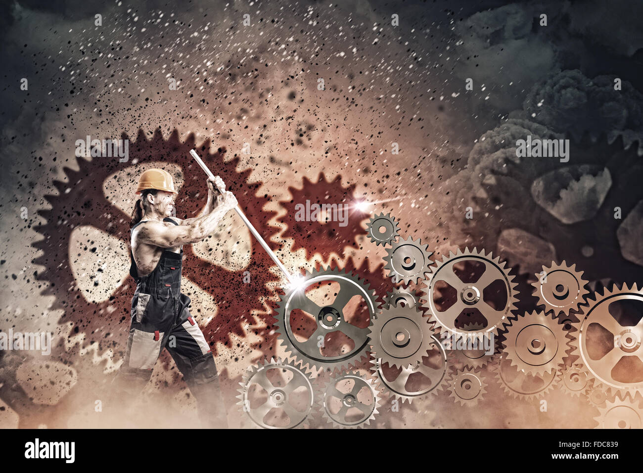 Strong man mechanic in uniform with spanner fixing mechanism Stock ...