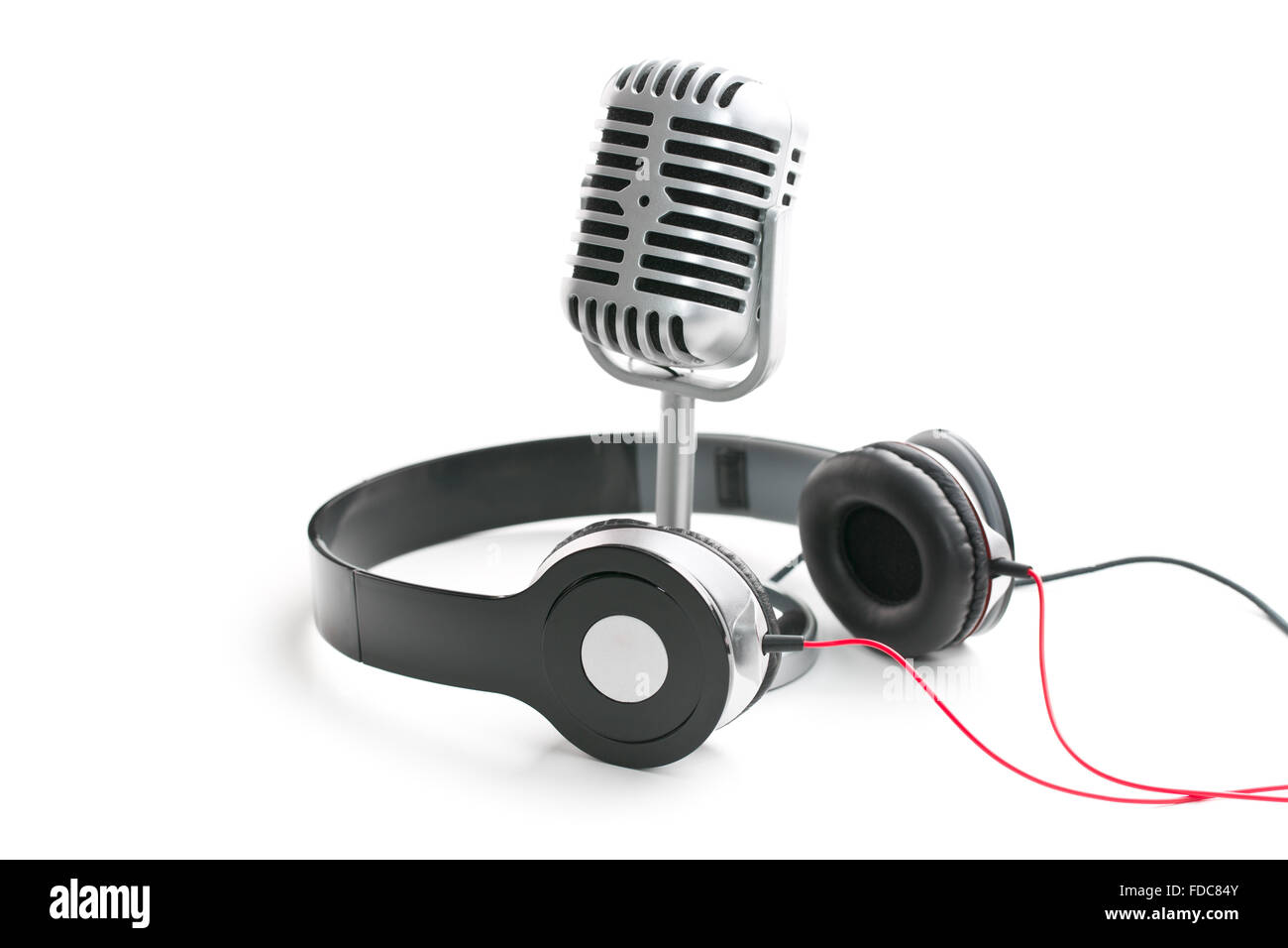 the classic vintage silver microphone and headphones Stock Photo - Alamy