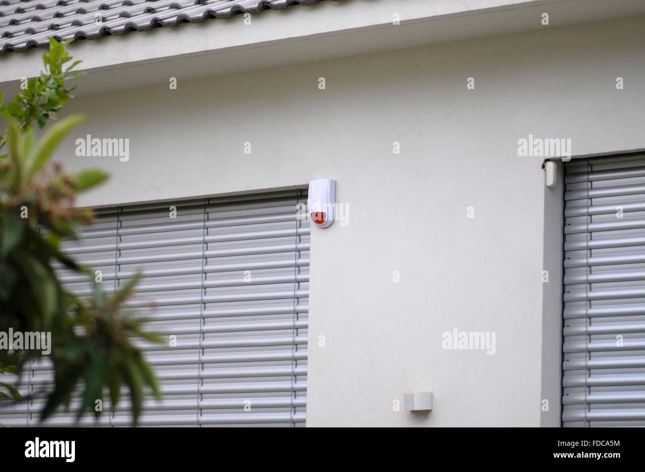 outdoor motion detector for a home security system Stock Photo - Alamy
